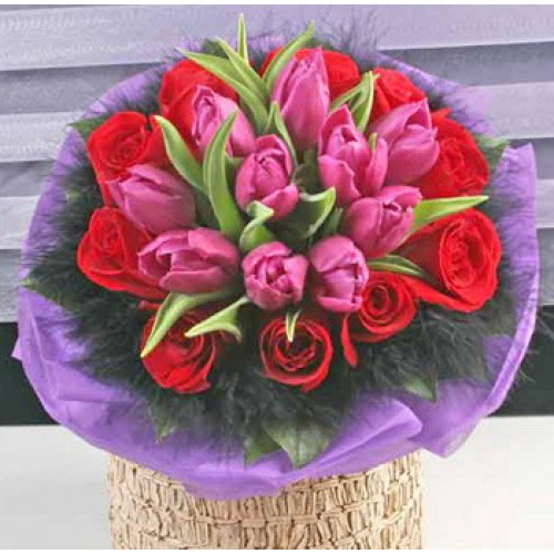 Pink Tulips with Red Holland Roses in a Bouquet