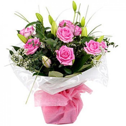 One dozen Pink Roses in a Bouquet